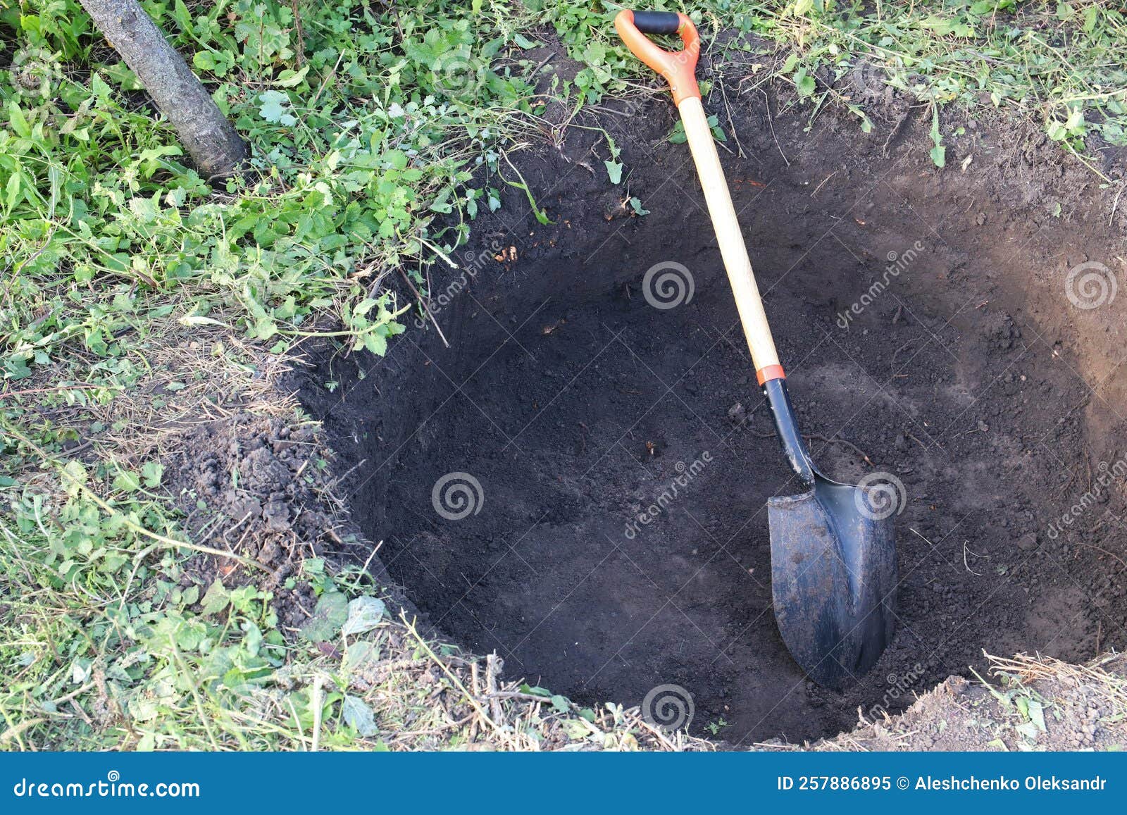 Deep Pit in the Ground. in the Pit Lies a Shovel Stock Image - Image of ...