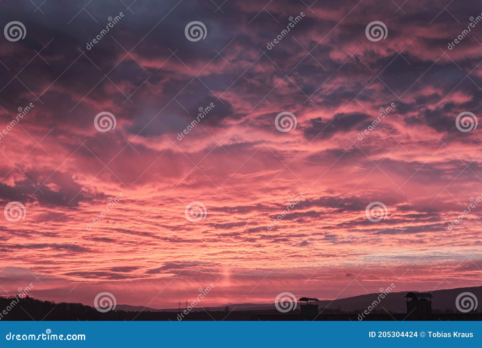 A Deep Purple Sunset with Dark Clouds in the Morning Stock Photo ...