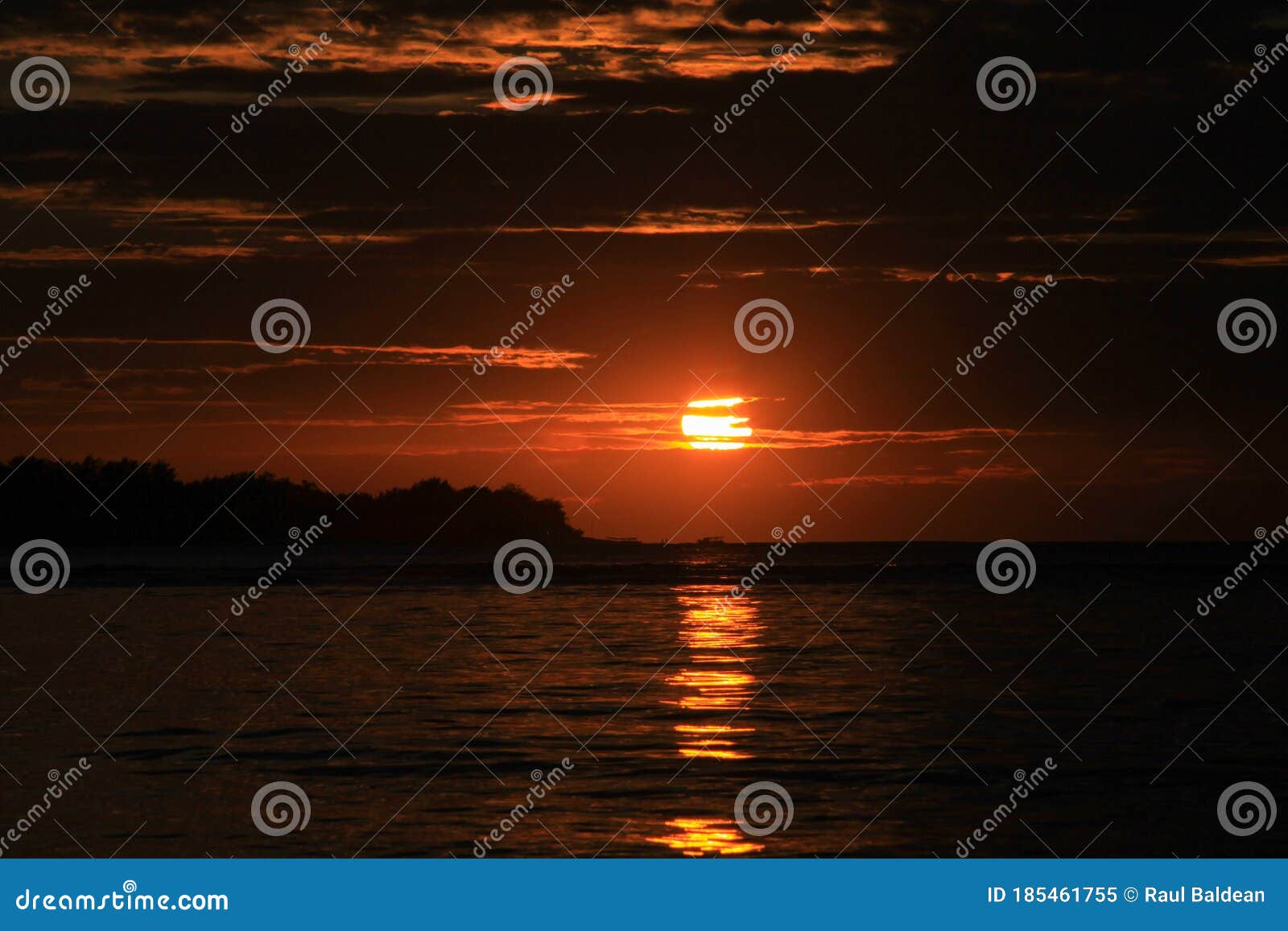 Deep Red Sunset and Water Surface Sun Reflection Stock Image - Image of ...