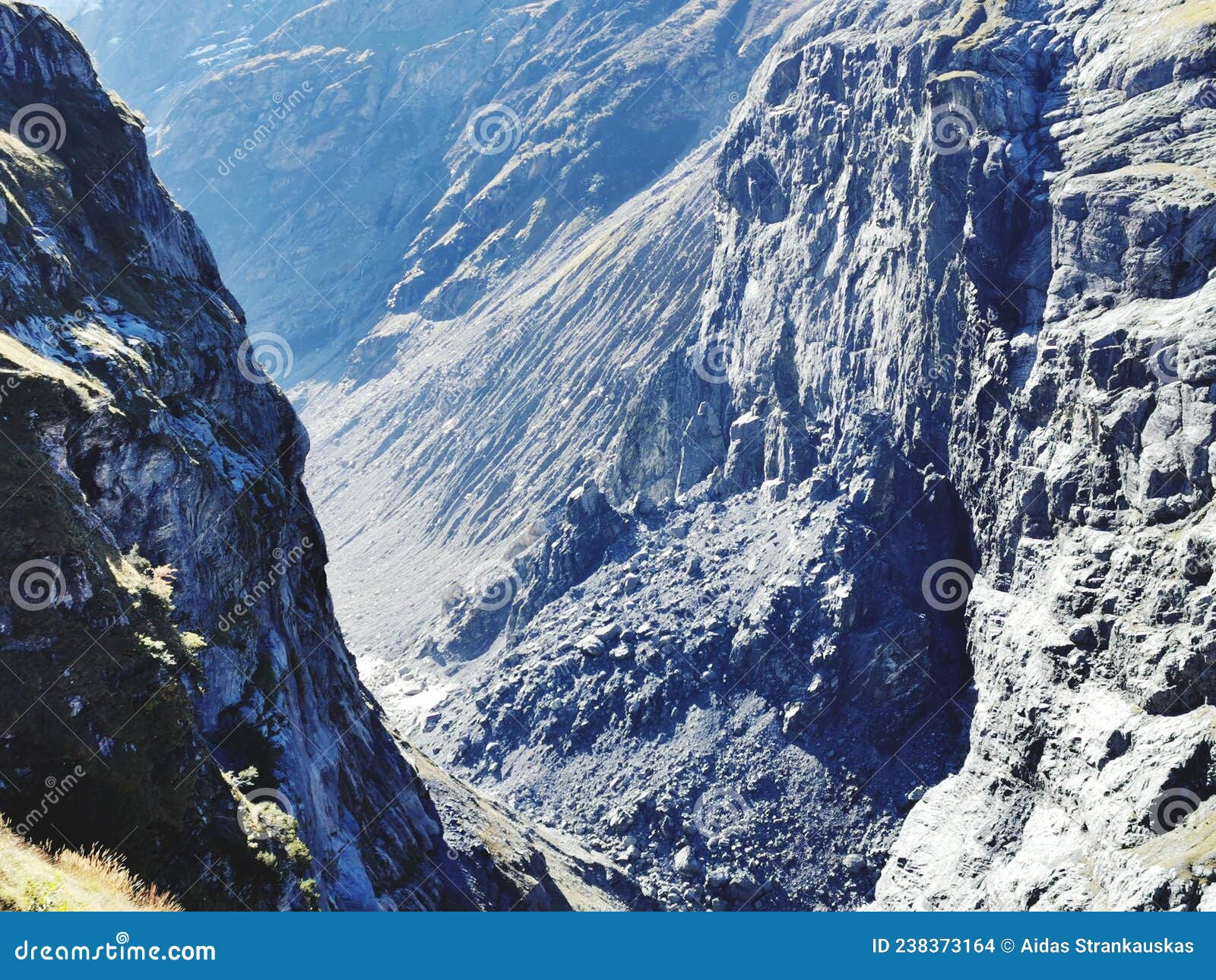 Deep rocky mountain vally stock photo. Image of ridge - 238373164