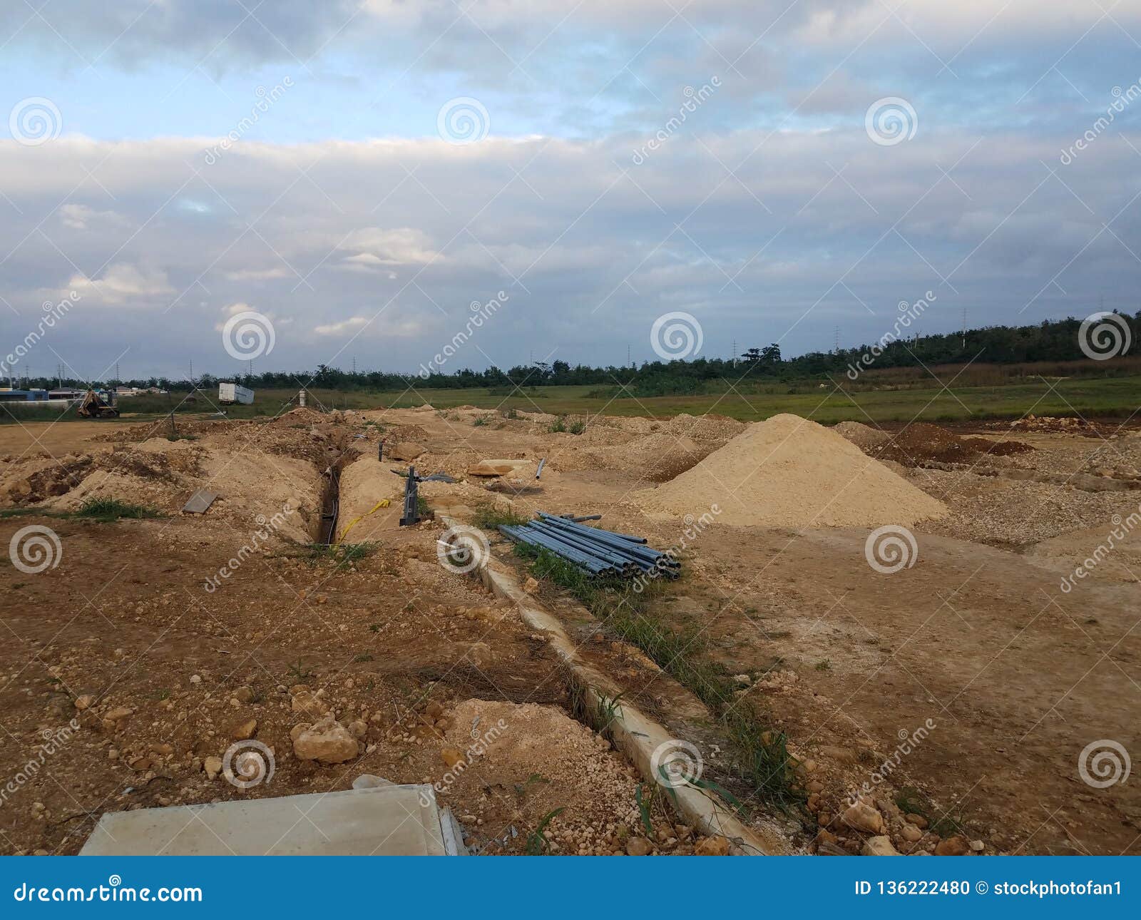 Deep Trench Cut in the Dirt at Construction Site Stock Photo - Image of ...