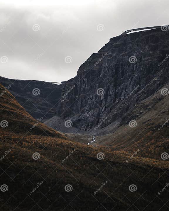 A Deep Valley with Steep Cliff. a River on the Bottom of Valley Stock ...