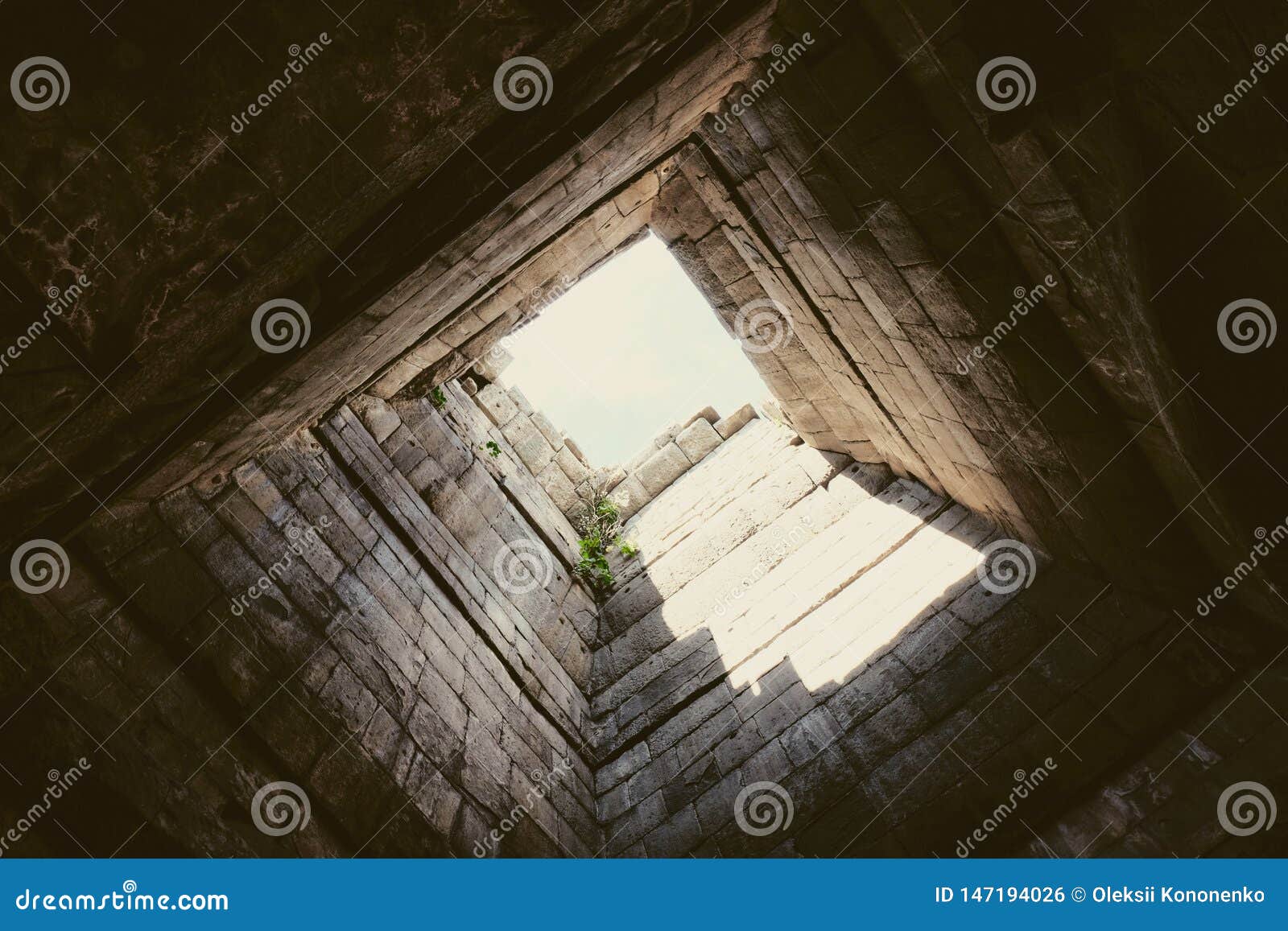 Deep Well, the Walls of Which are Lined with Stone. Bottom View. Light ...