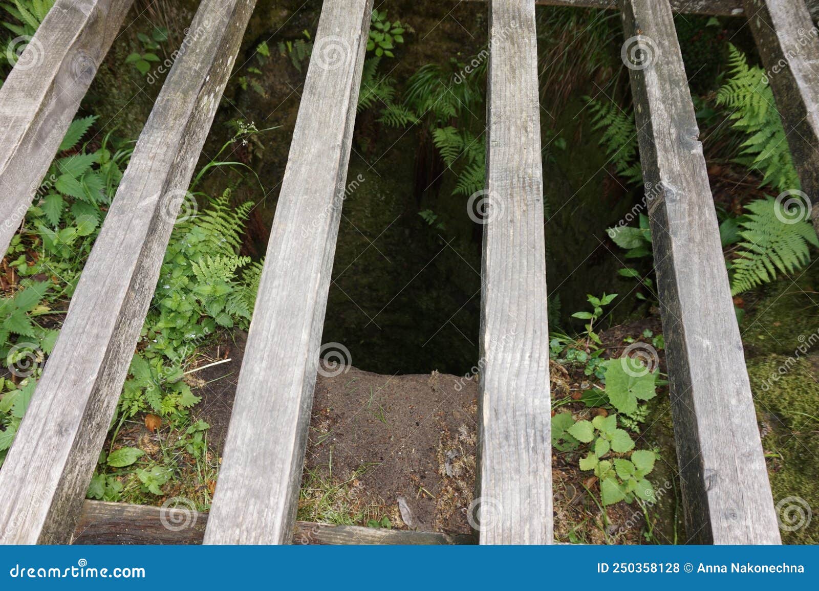 A Deep Well for Water Carved into the Rock. Stock Photo - Image of ...