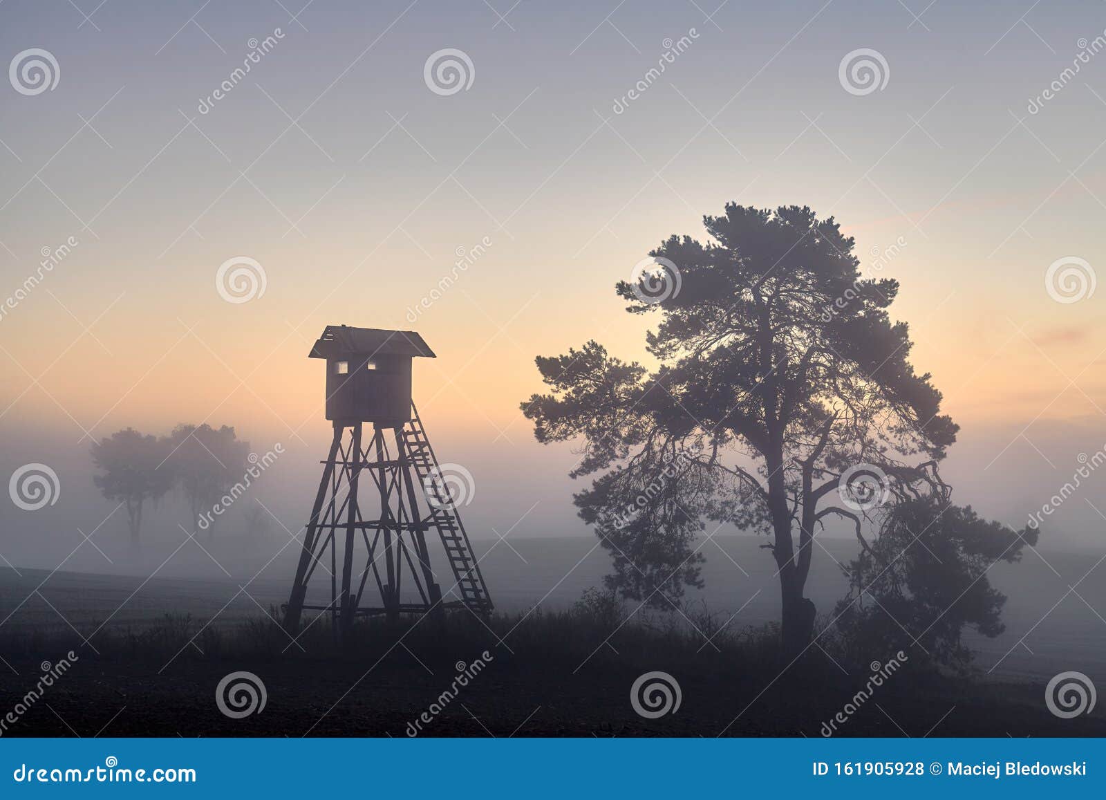Deer Hunting Tower on a Field in Autumn at Dawn Stock Photo - Image of ...