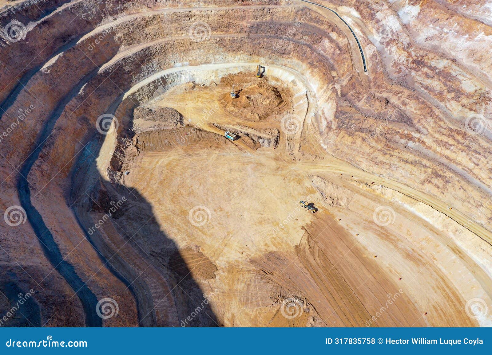 Open Pit Mine in Full Operation, with Machinery Extracting Minerals ...