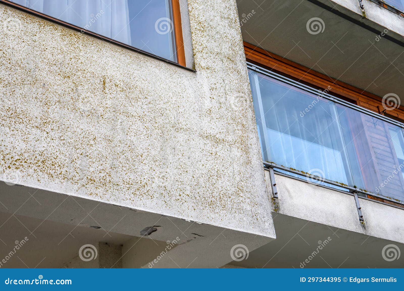 Defects in the Facade of the Building. Moss on the Wall by the Windows ...