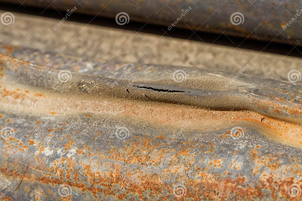 Defects on the steel pipe stock image. Image of power - 56681597