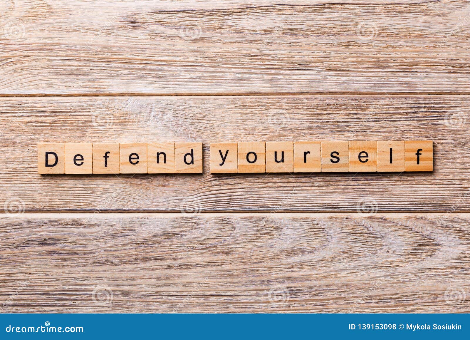 Defend Yourself Word Written on Wood Block. Defend Yourself Text on ... Defend Yourself Word Written on Wood Block. Defend Yourself Text on ...
