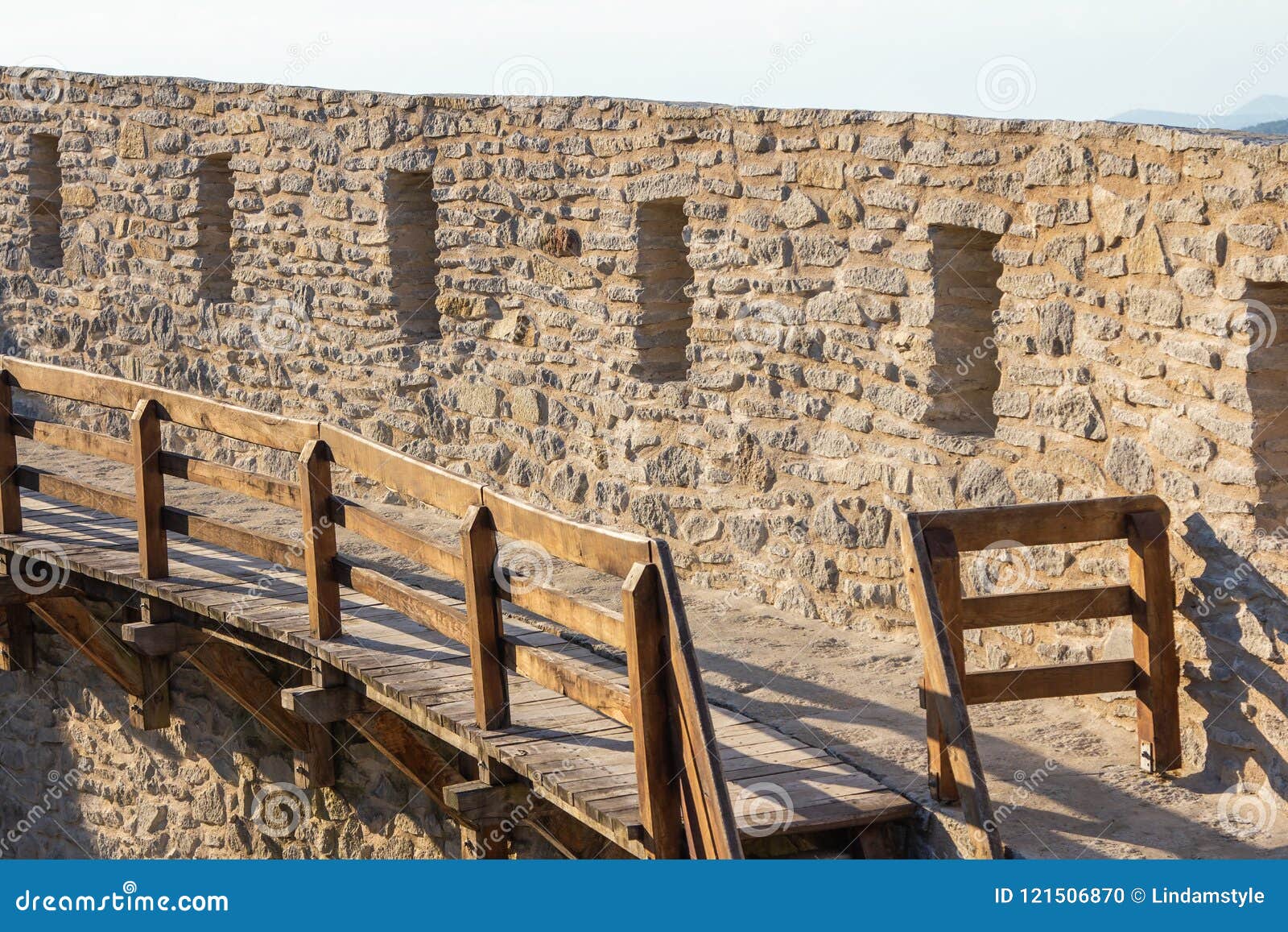 Defensive Stone Wall Construction Stock Photo - Image of small, windows ...
