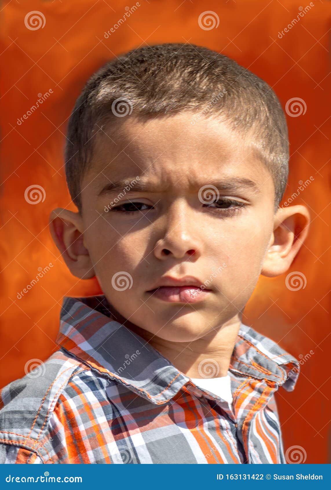 Defiant Expression on a Young Boy Stock Photo - Image of cute, look ...