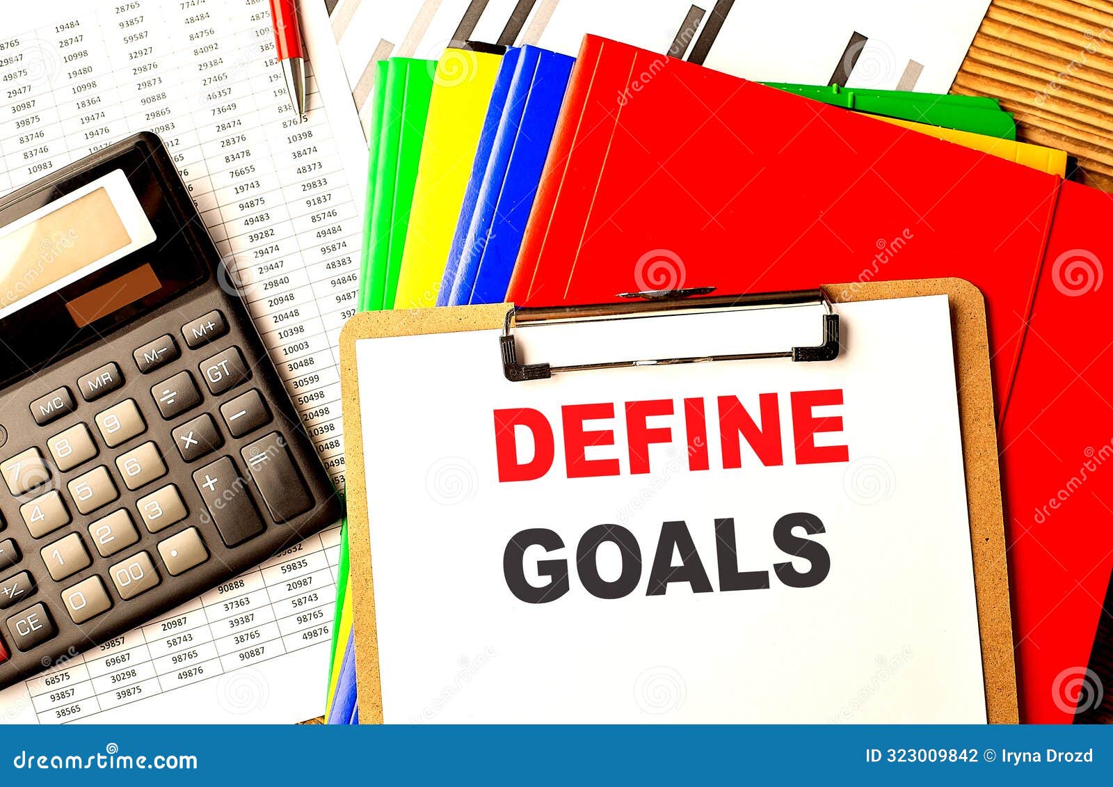DEFINE GOALS Text on Clipboard with Calculator and Color Folder Stock ...