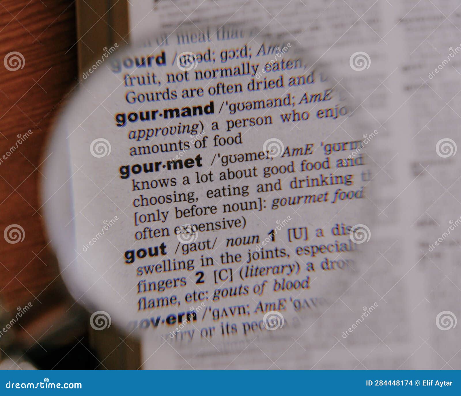 The Definition of the Word Gourmet in a Dictionary, Under Magnifying ...