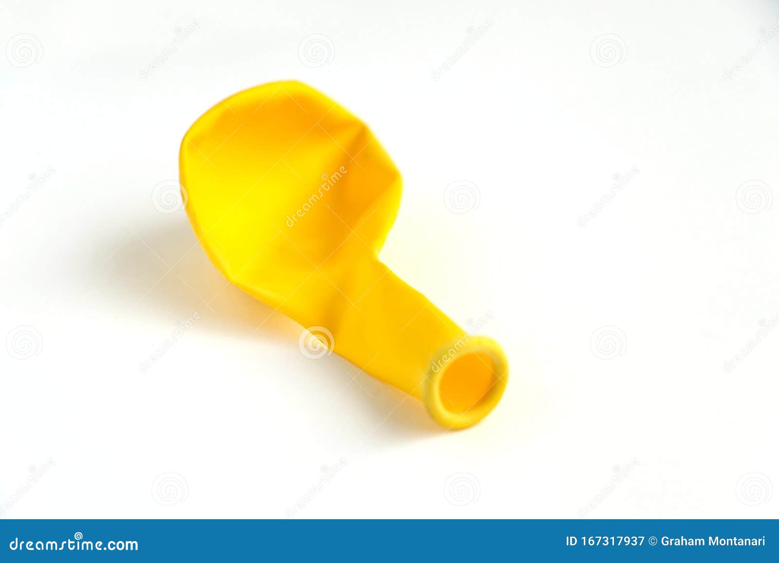 Deflated Yellow Balloon Isolated On A White Background Stock Photo ...