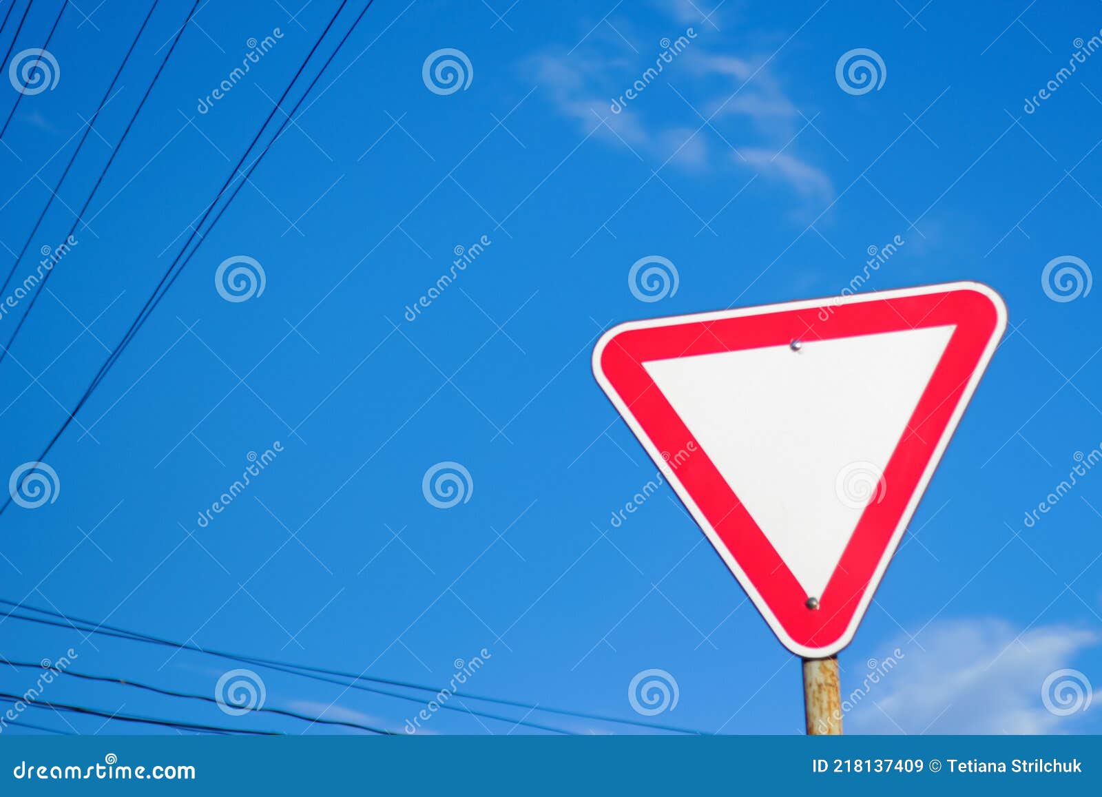 Defocus Blank Empty Triangle Red Warning Road Sign with Blue Sky ...
