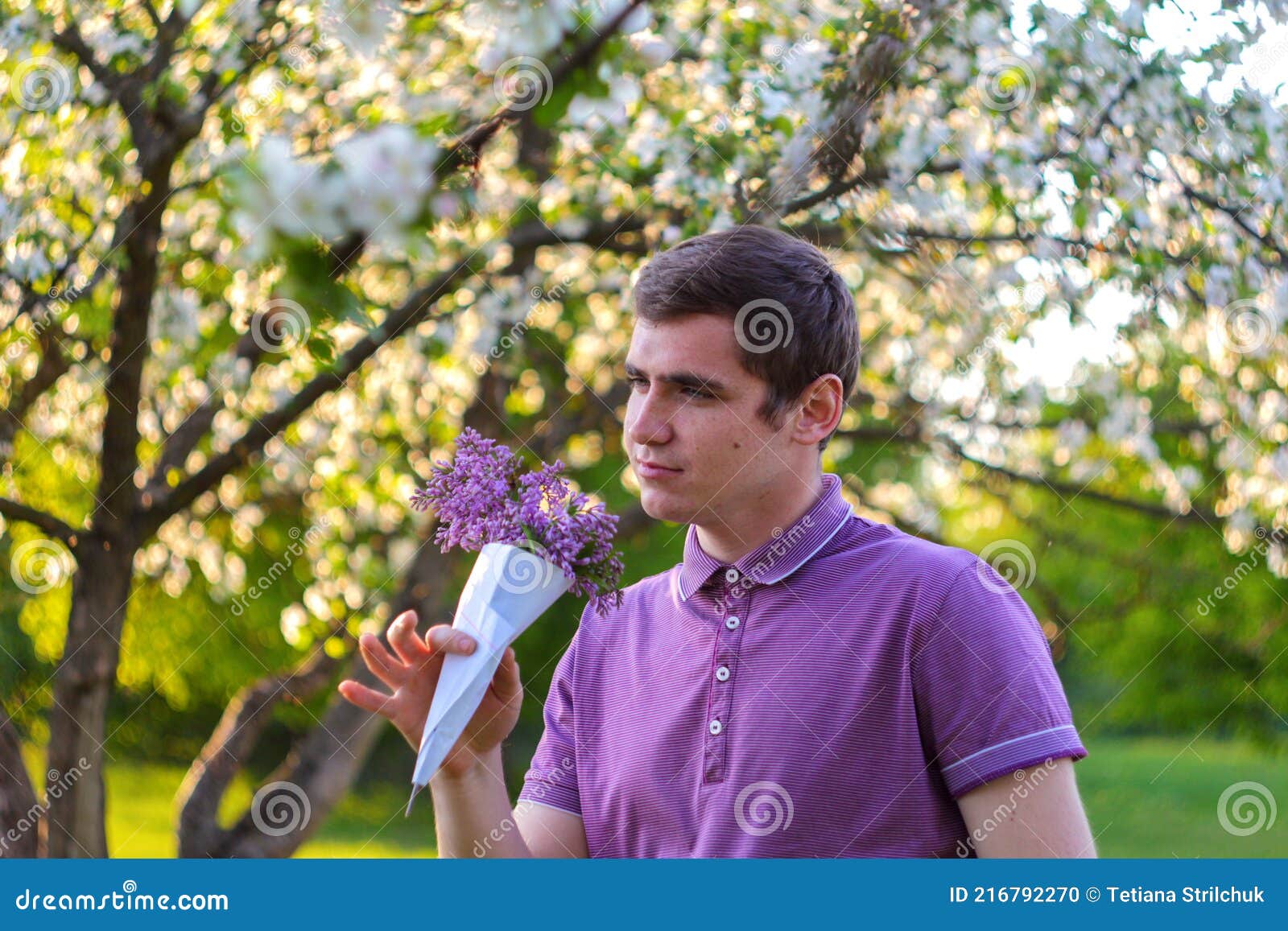 Defocus Portrait of Handsome Caucasian Man with Cone Flowers in Purple ... Defocus Portrait of Handsome Caucasian Man with Cone Flowers in Purple ...