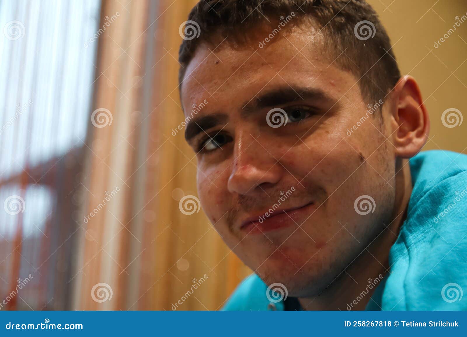 Defocus Portrait of a Young Brunette Caucasian Man Indoor Smiling ... Defocus Portrait of a Young Brunette Caucasian Man Indoor Smiling ...