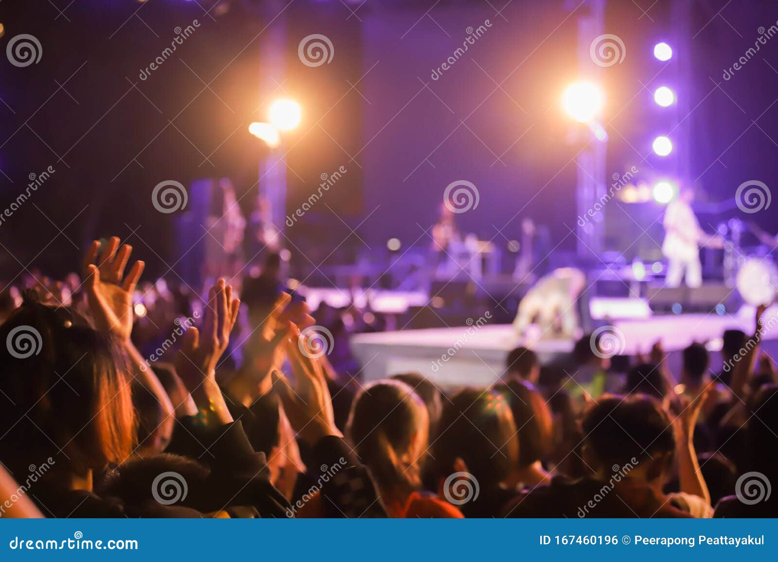Defocused Abstract Live Concert with Raising Hands. Silhouettes of ...
