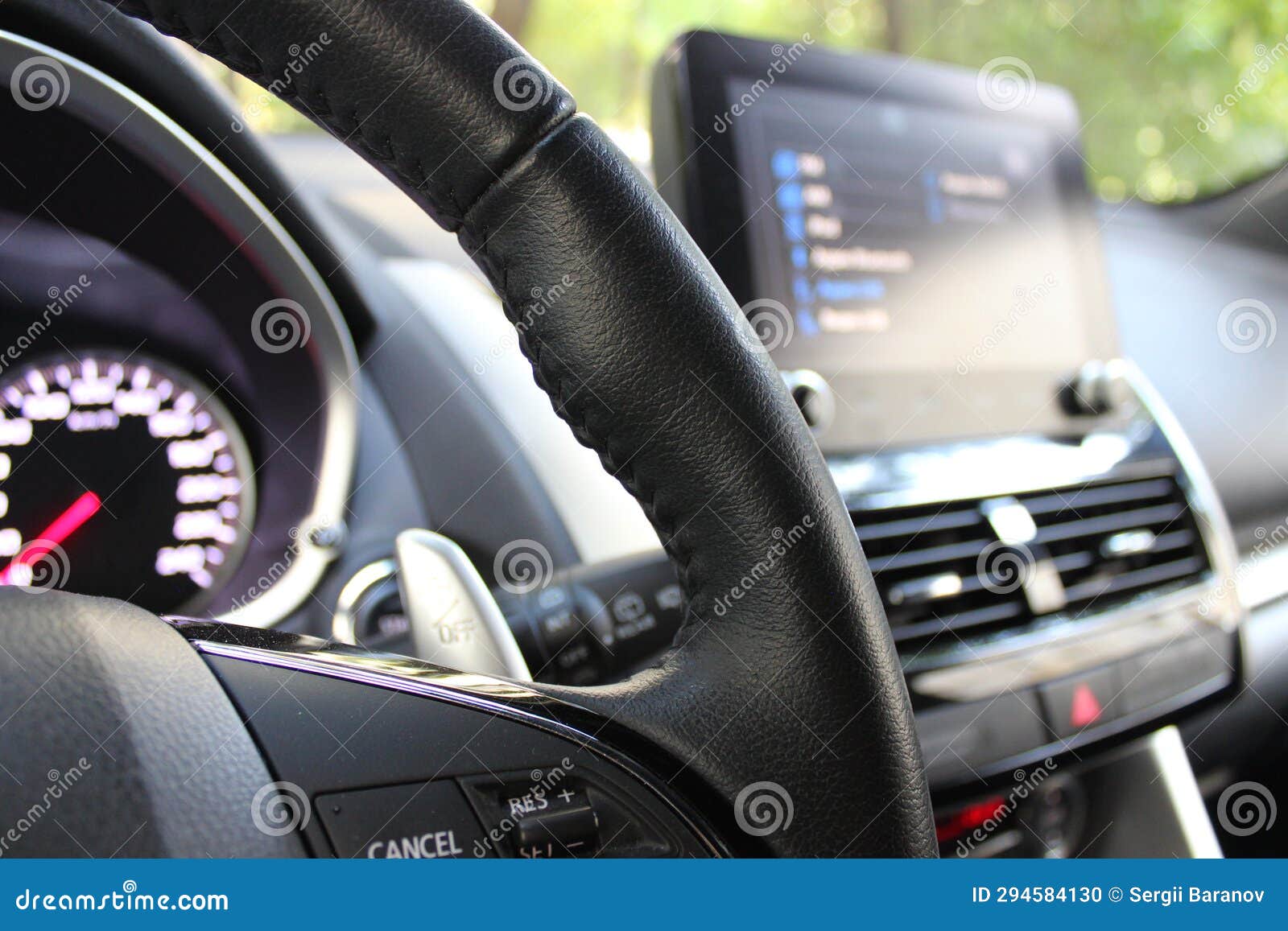 Defocused Monitor on the Central Panel of the Car Displays the Menu ...