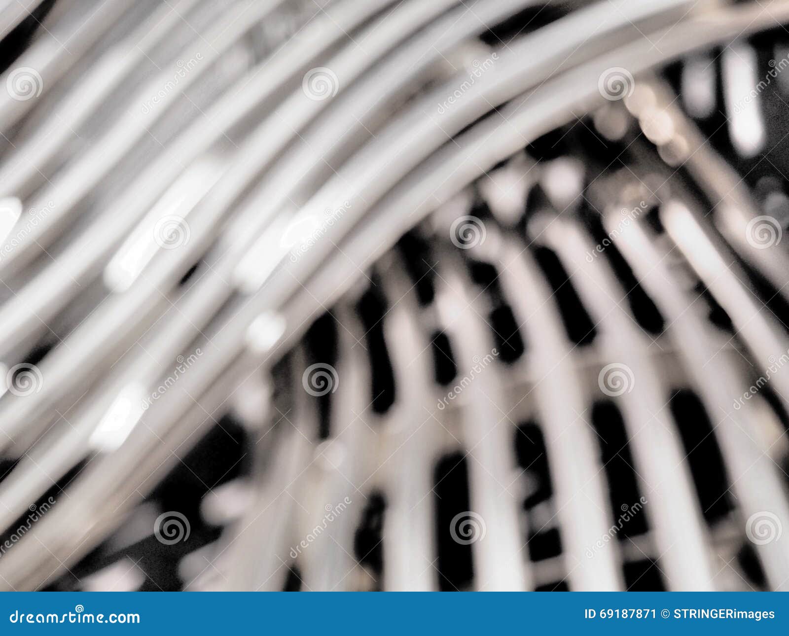 Defocussed Background of a Woven Steel Tube Pattern Stock Image - Image ...