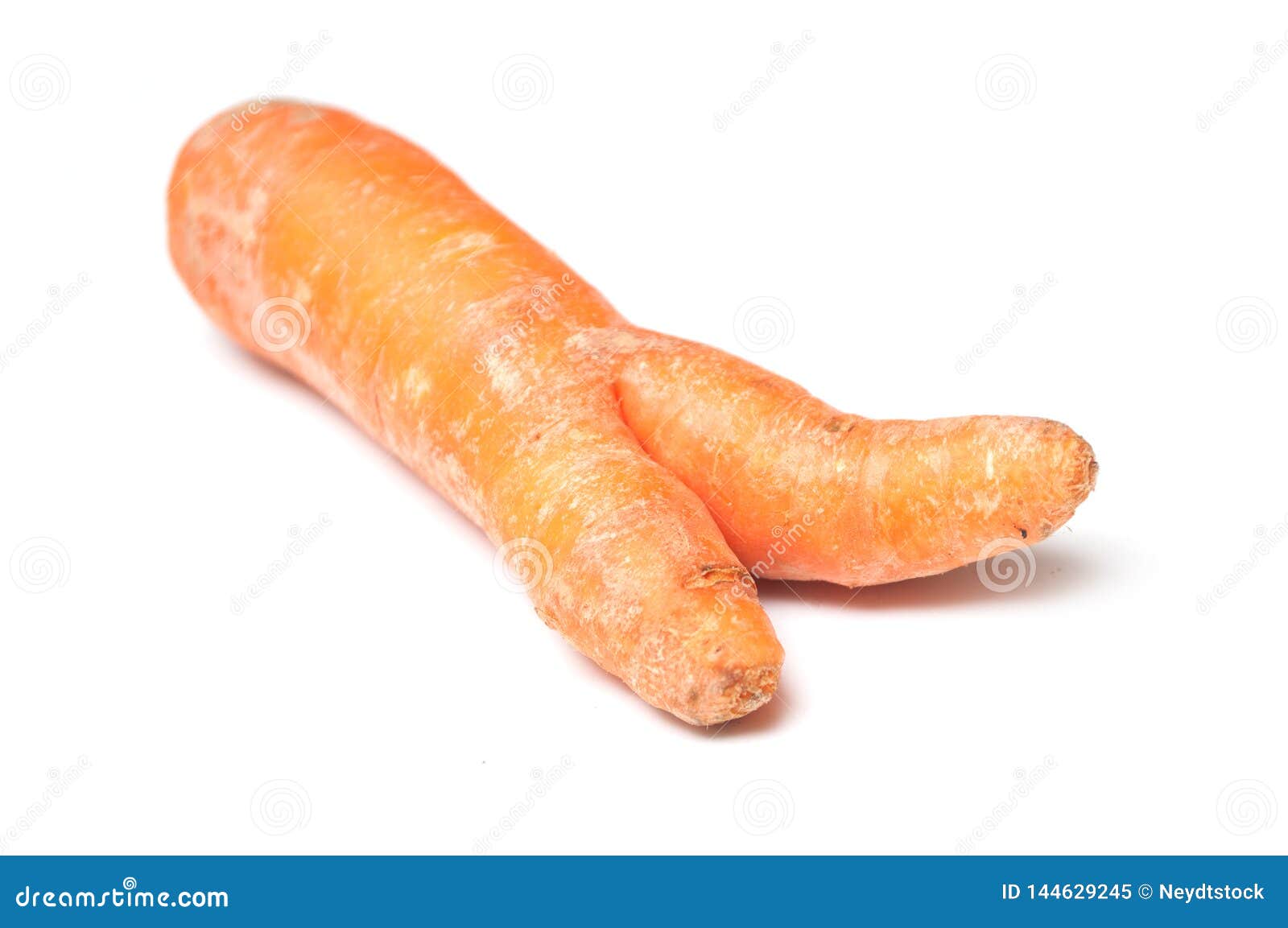 Deformed Carrot With Unusual Shape That Looks Like Human On A Plate ...