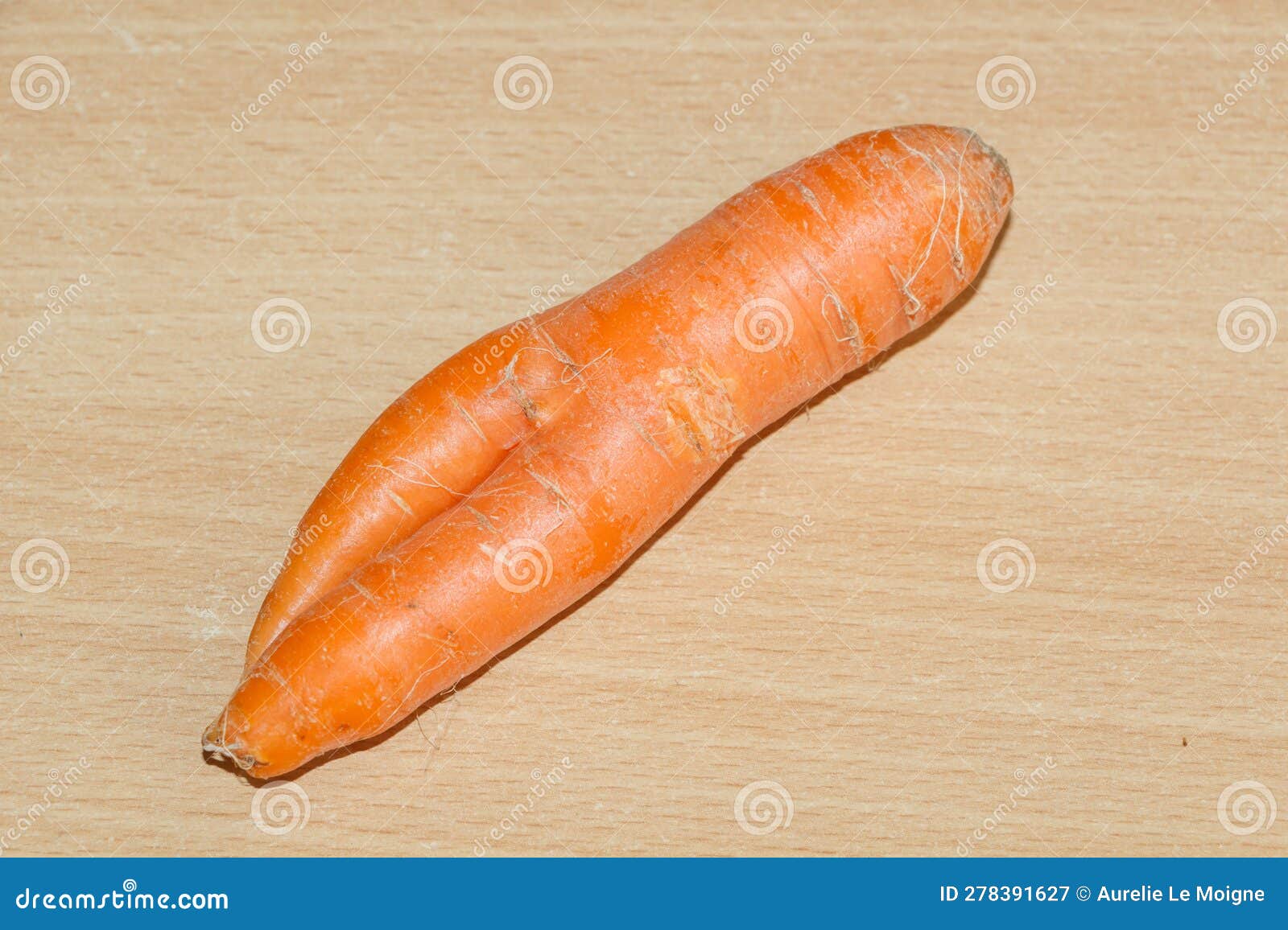 Deformed Carrot With Unusual Shape That Looks Like Human On A Plate ...