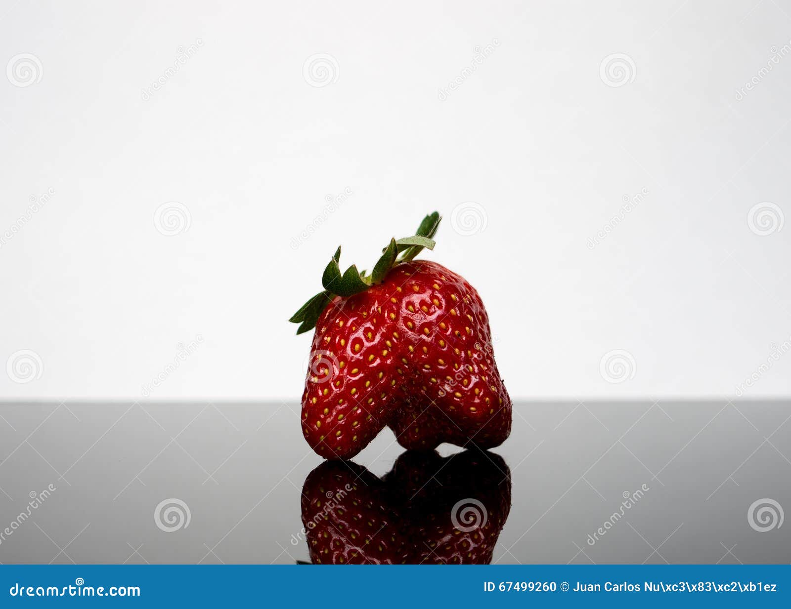 Deformed Strawberry stock photo. Image of strange, green - 67499260