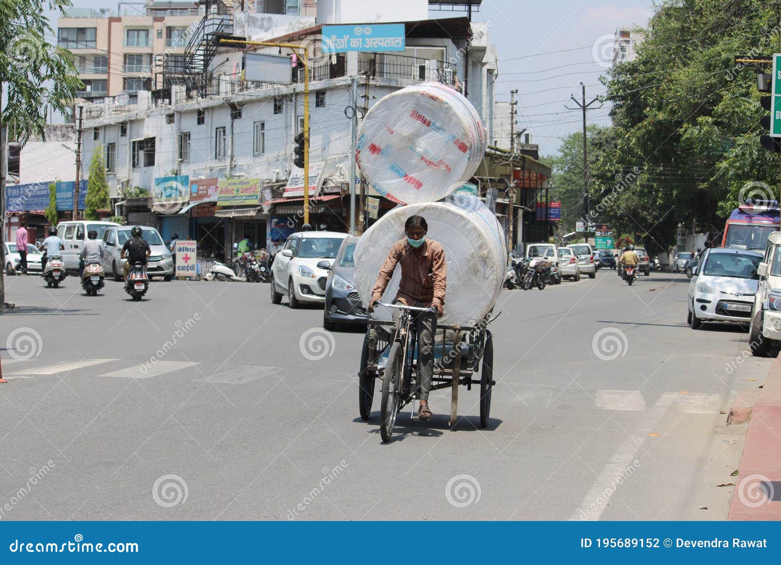 A Rickshaw Puller Going on Road with Water Tanks Editorial Photography ...