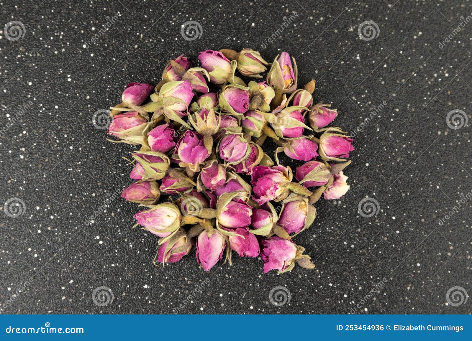 Dehydrated Pink Rose Buds Top Down View on a Black Cutting Board Stock ...