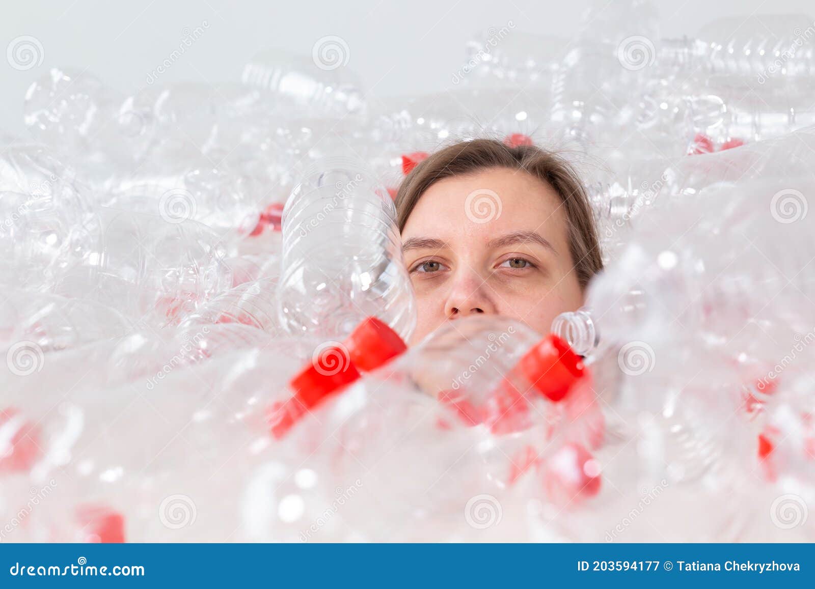Dehydrated Sick Woman is Lying in a Pile of Plastic Bottles ...