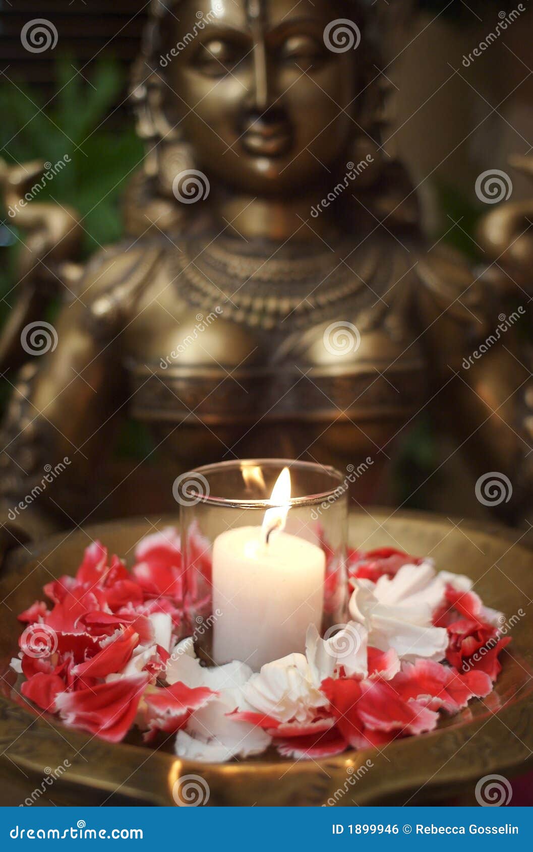 Deity Sculpture with Flower Petals Stock Photo - Image of goddess ...