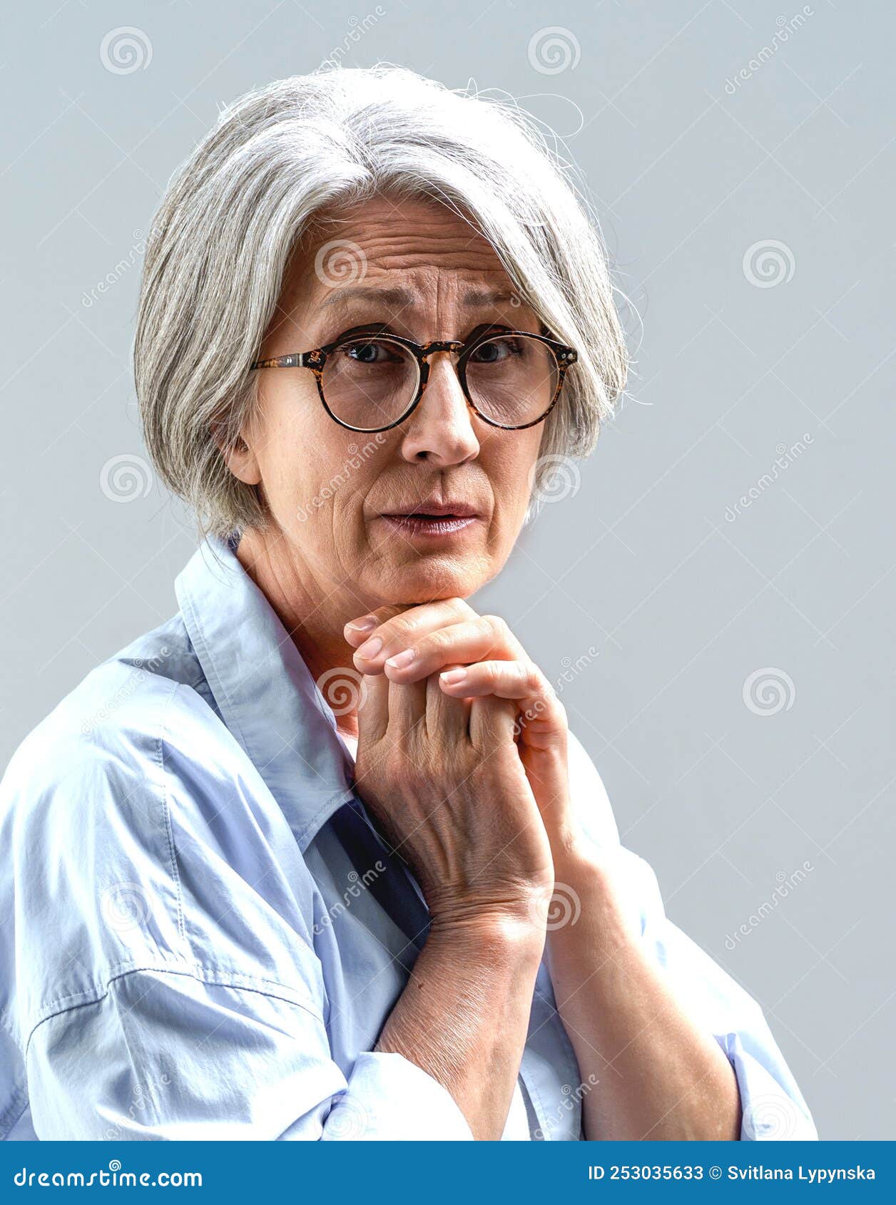 Dejected Frustrated Full Of Hope Grey Haired Mature Woman With Folded