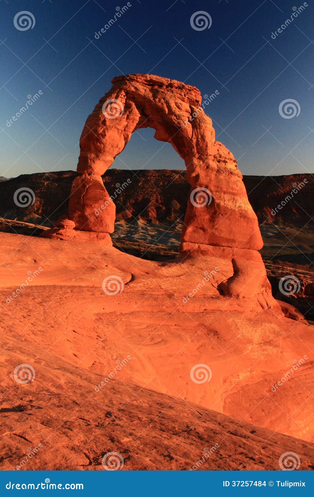 Delicate Arch at sunset stock photo. Image of erosion - 37257484