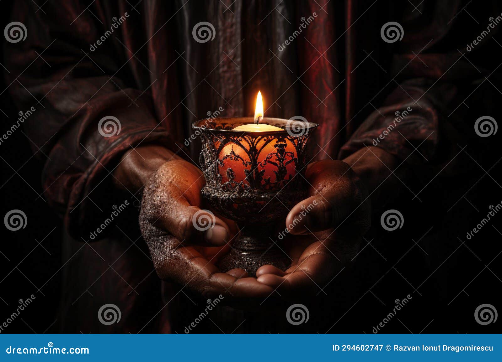Hands Cradling a Candle, with Its Soft, Warm Glow As the Sole Source of ...