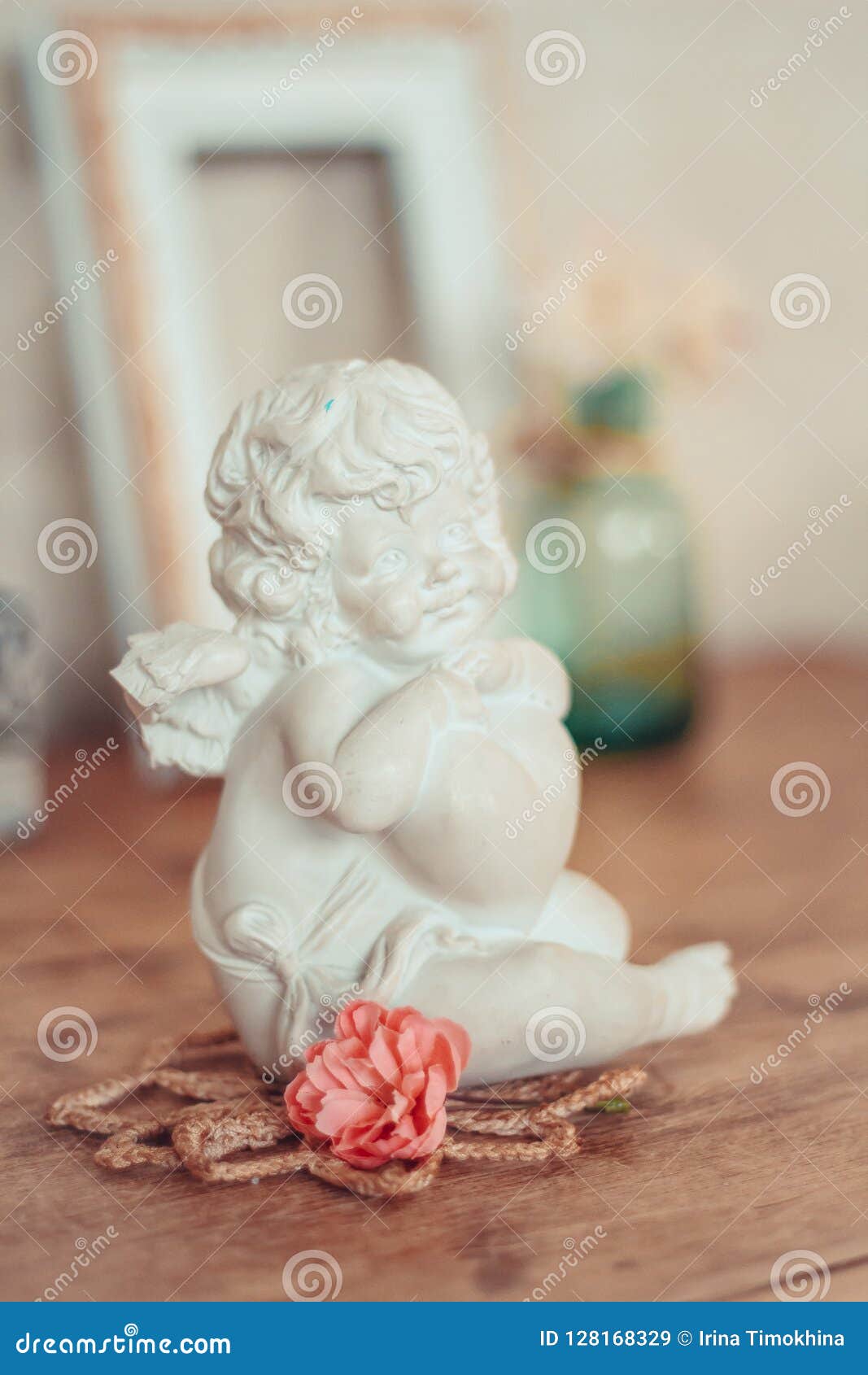 Delicate Composition with a Figure of an Angel Decorated in Rust Stock ...