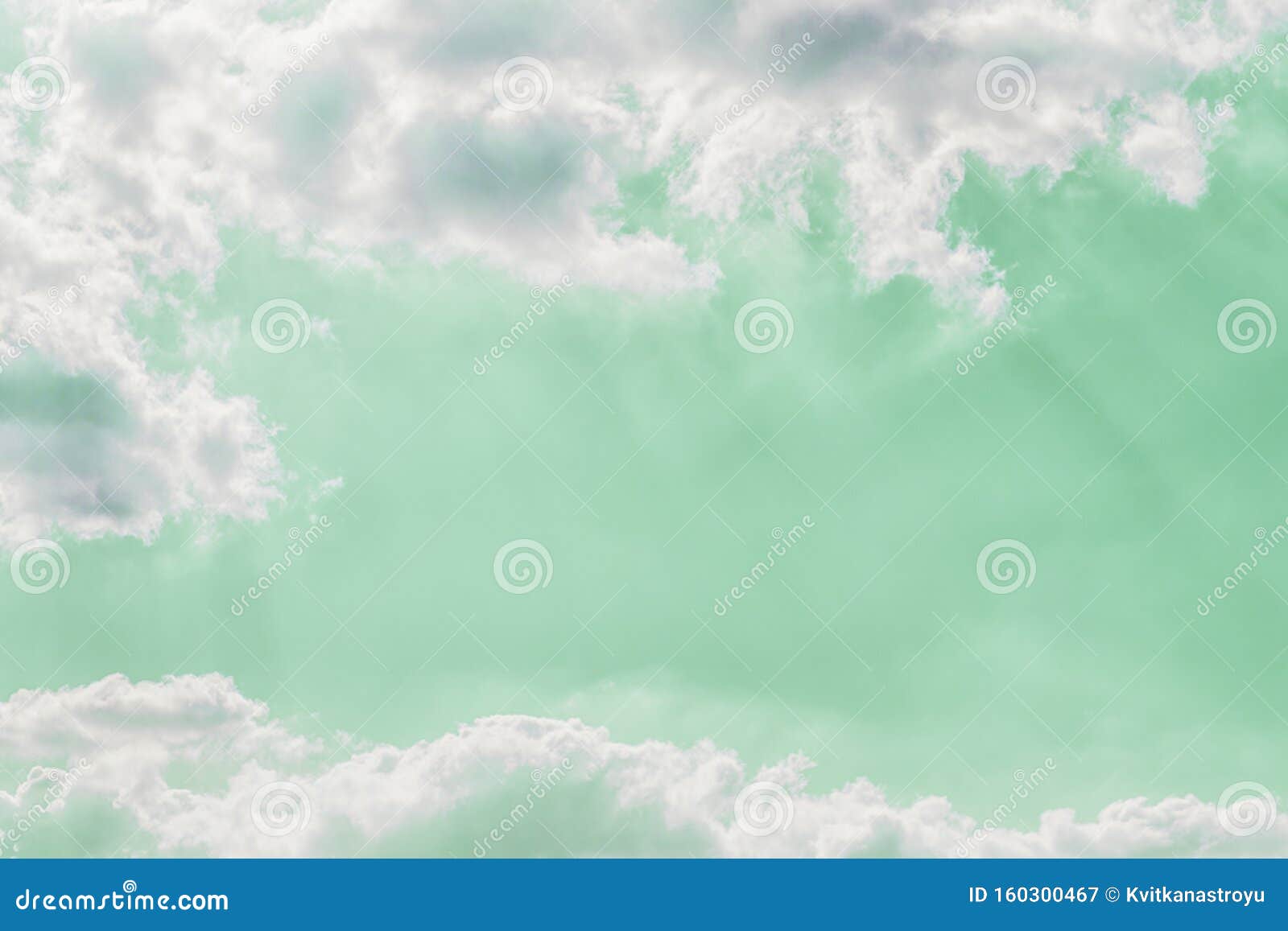 Delicate Light Rays through Clouds on a Pastel Green Color Sky ...