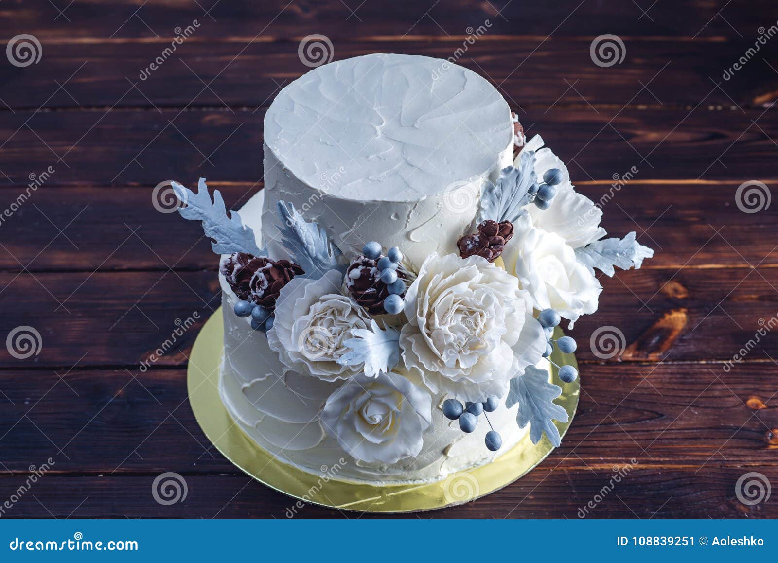 Delicate White Bunk Wedding Cake Decorated with an Original Design ...
