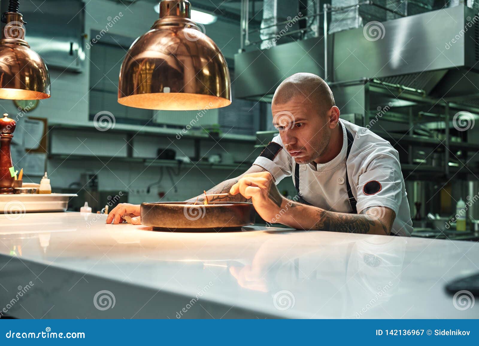 Delicate Work. Confident Chef Decorating Delicious Chocolate Cake while ...