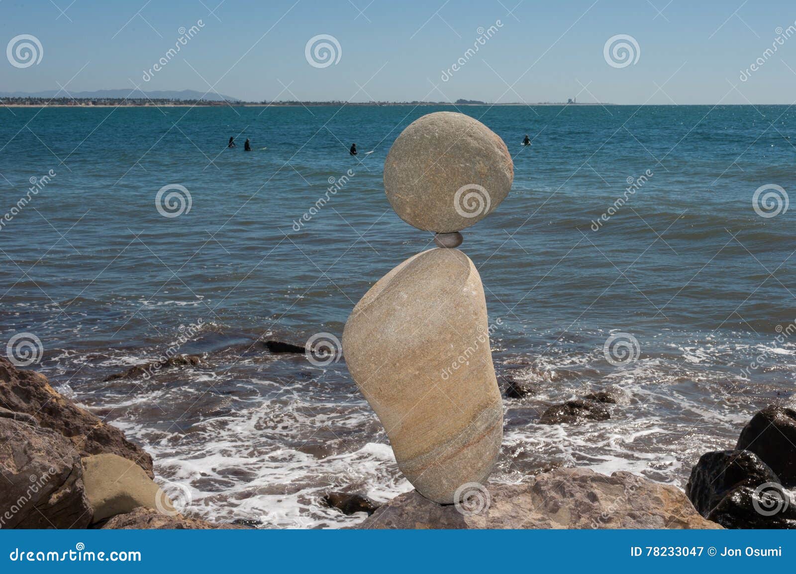 Delicately Stacked Rocks on the Beach Stock Image - Image of balanced ...