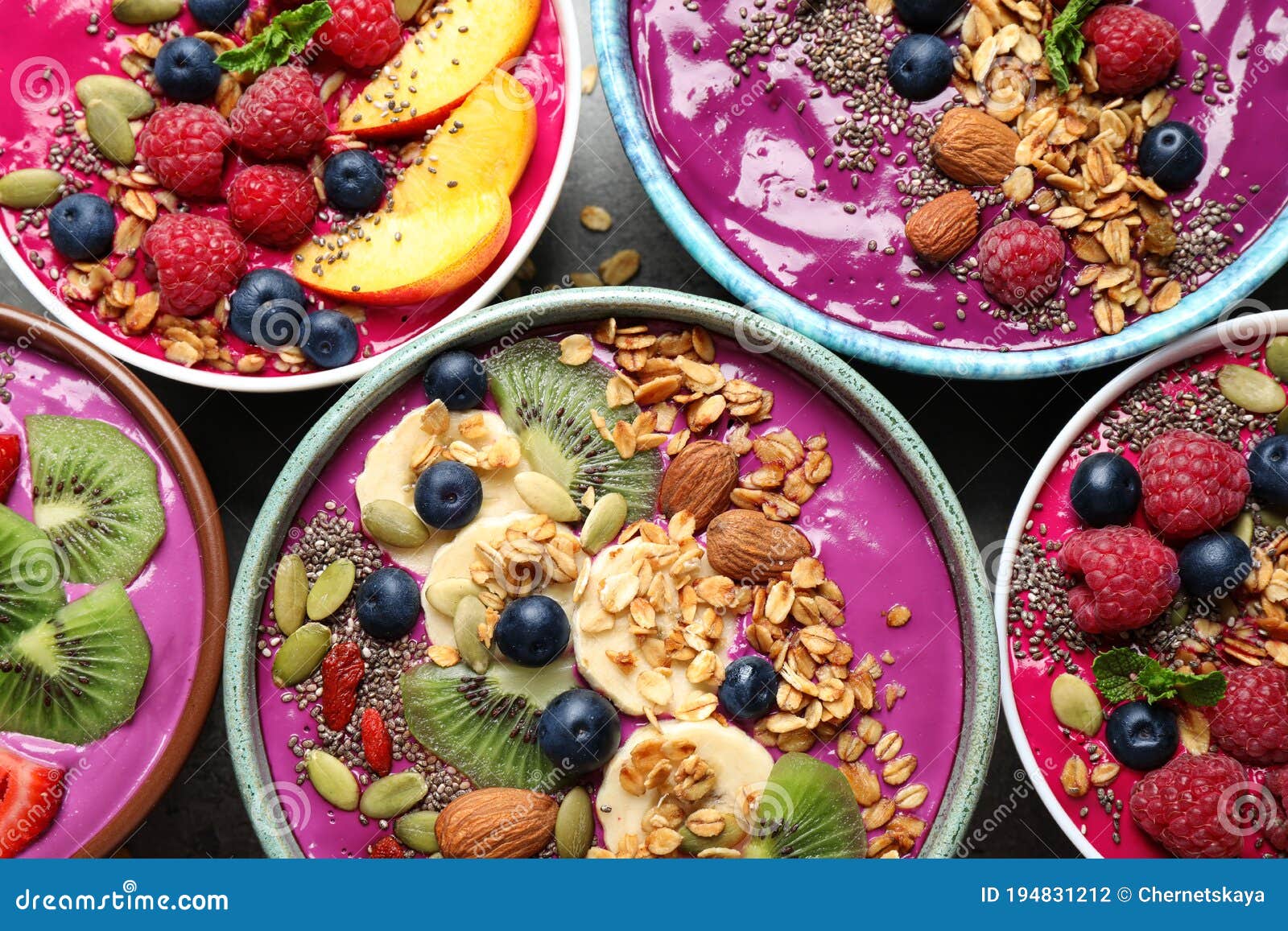 Delicious Acai Smoothie with Toppings in Bowls on Table Stock Photo ...
