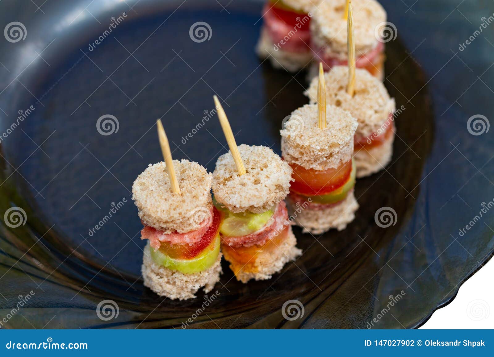 Delicious Appetizer Canapes of Black Bread, and Vegetables Stock Photo ...