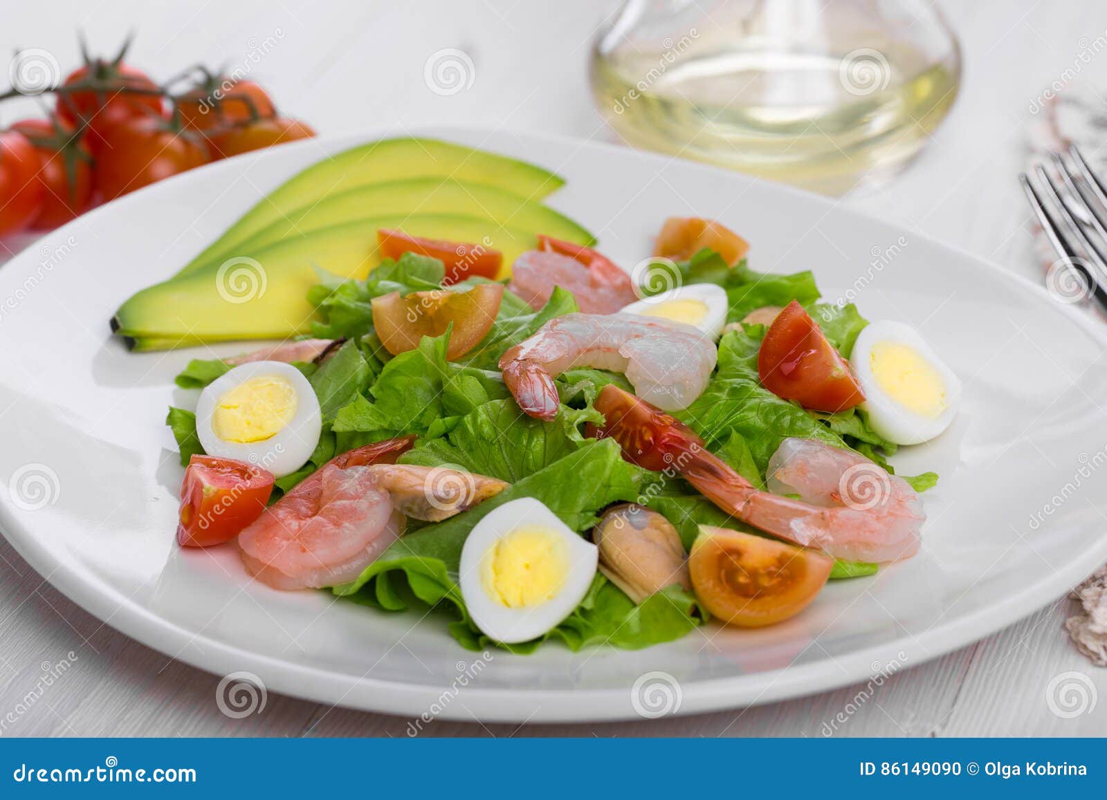 Delicious Appetizing Vegetable Salad with Seafood on a White Plate ...