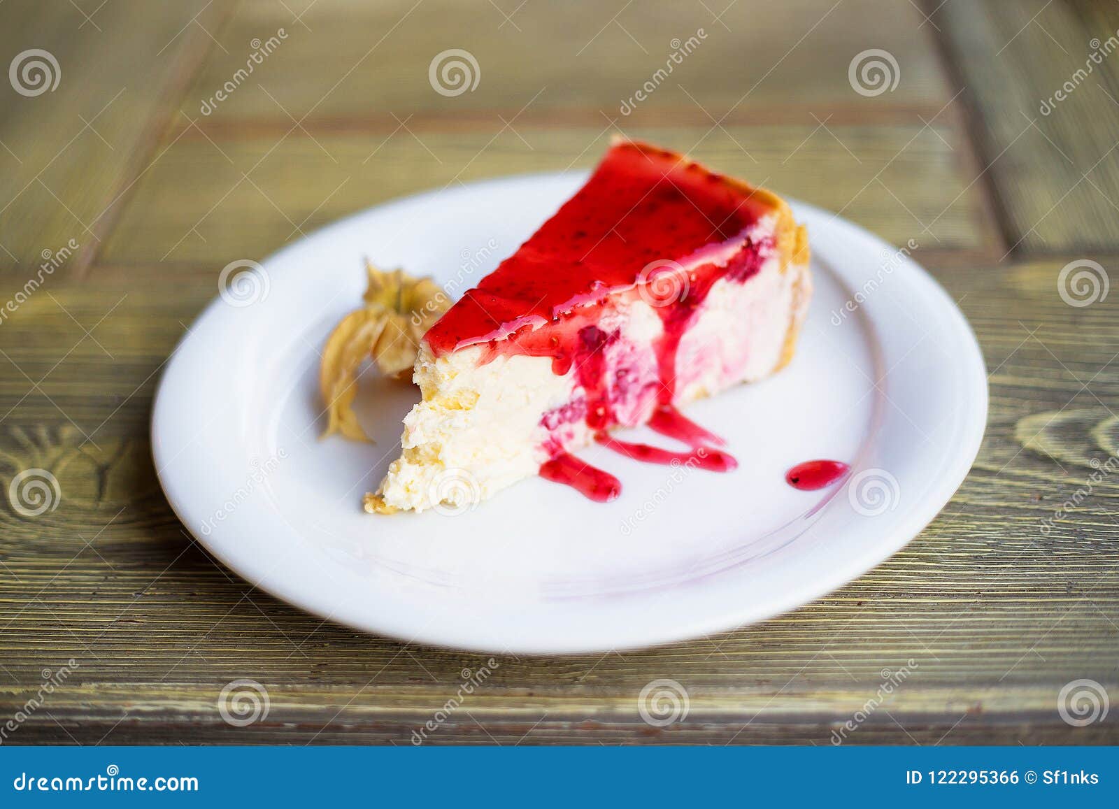 Delicious and Beautiful Cheesecake with Strawberry Jam. Stock Photo ...