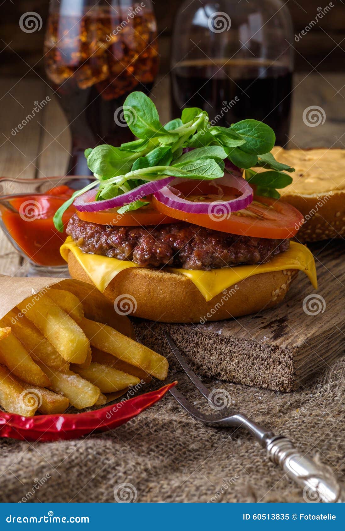 Delicious Beef Burger with Chips and Soda on Wooden Table. Stock Image ...