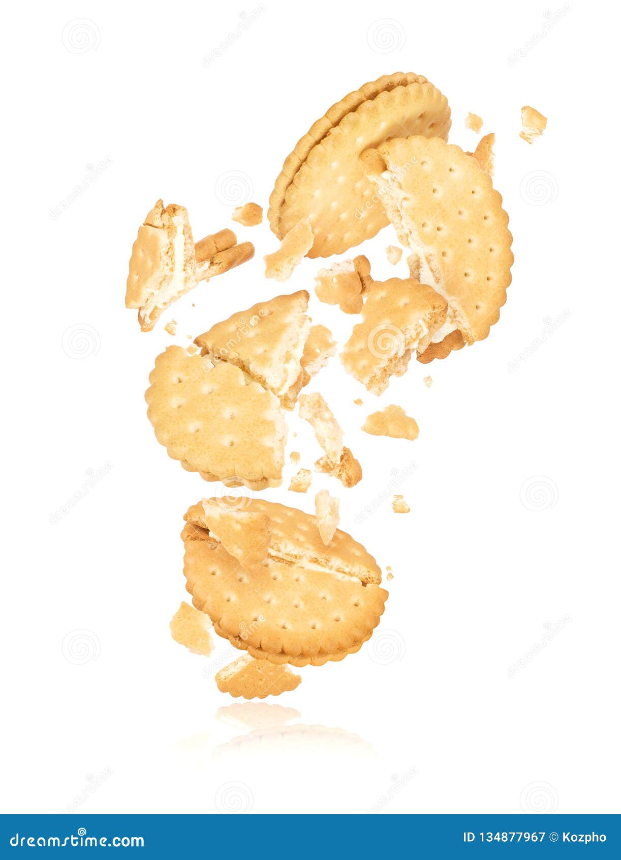 Delicious Biscuits Crushed into Pieces in the Air, Isolated on White ...