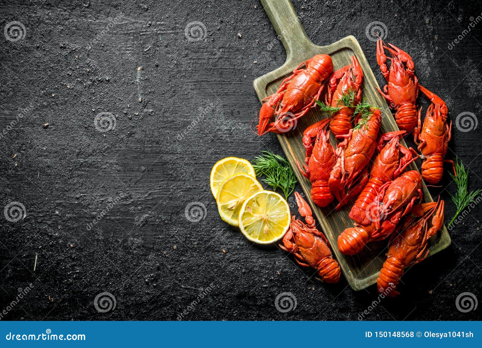 Delicious Boiled Crayfish on a Cutting Board with Sliced Lemon and Dill ...