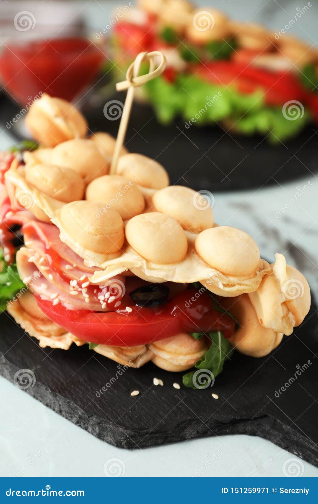 Delicious Bubble Waffle with Meat on Slate Plate Stock Image - Image of ...