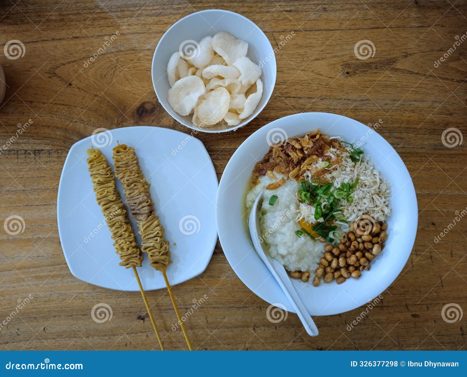 Delicious Bubur Ayam with Various Toppings with Crackers and Chicken ...
