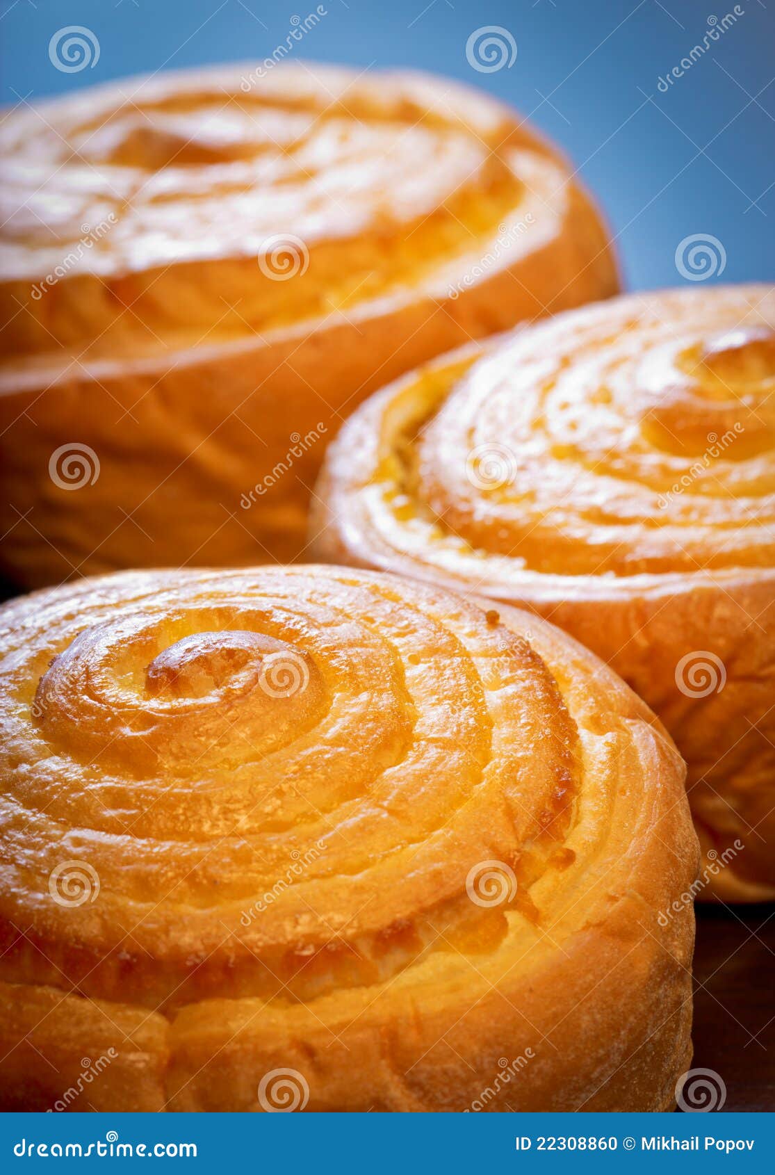 Delicious Buns with Fun Curls Stock Photo - Image of glaze, gold: 22308860