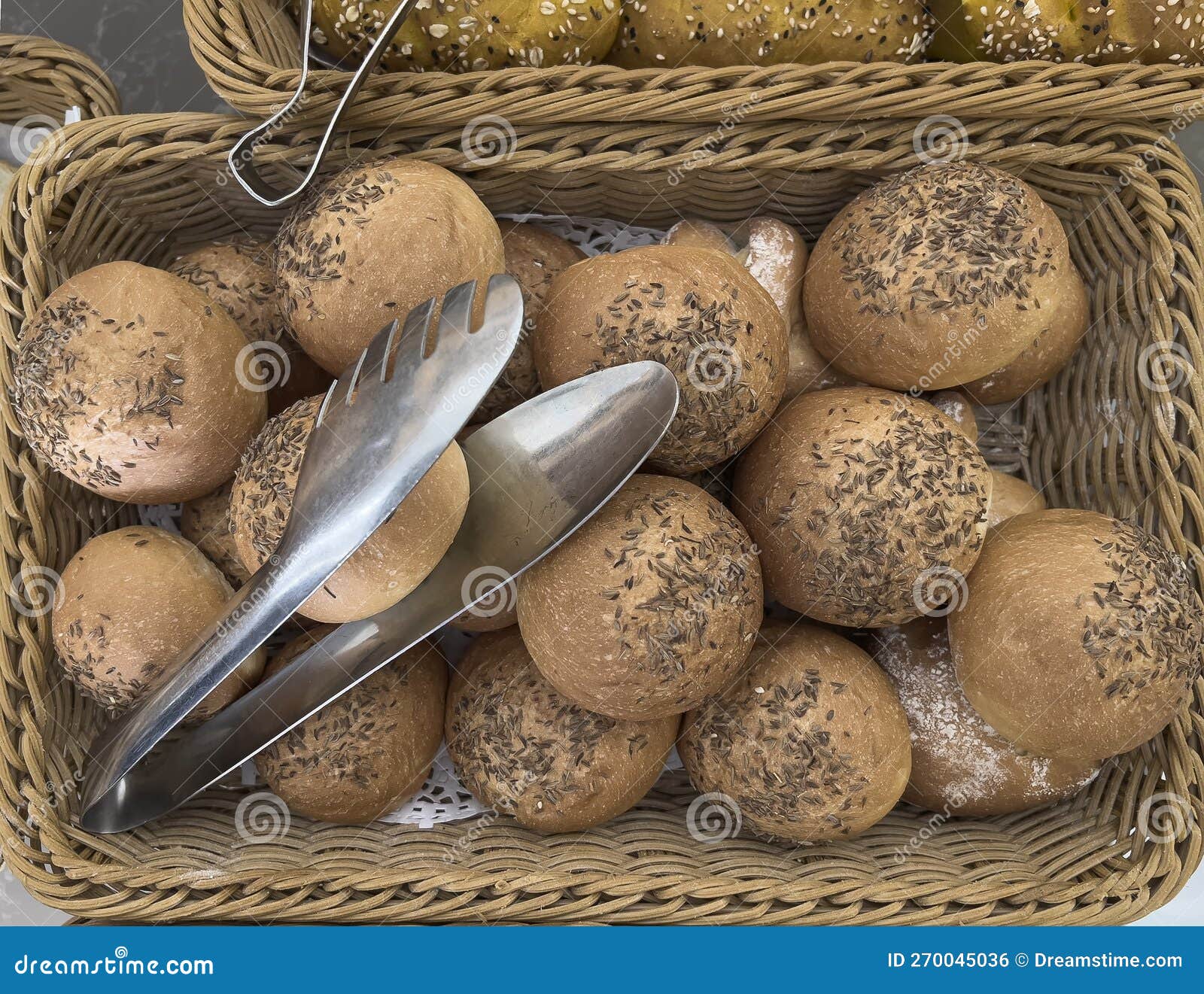 Delicious Buns in a Wicker Basket on the Table. Stock Photo - Image of ...